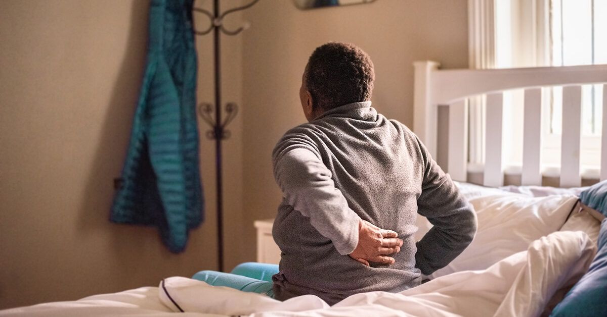 Is Back Pain a Symptom of COVID-19? What Research Shows