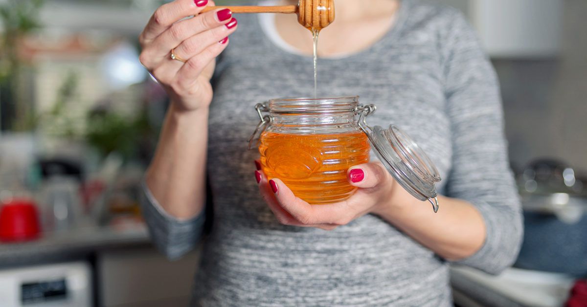 Applying honey on face store