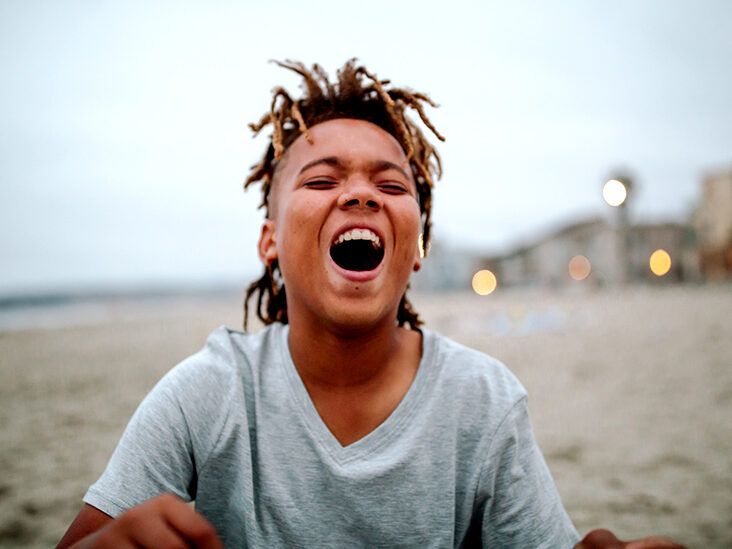 is crying while laughing normal