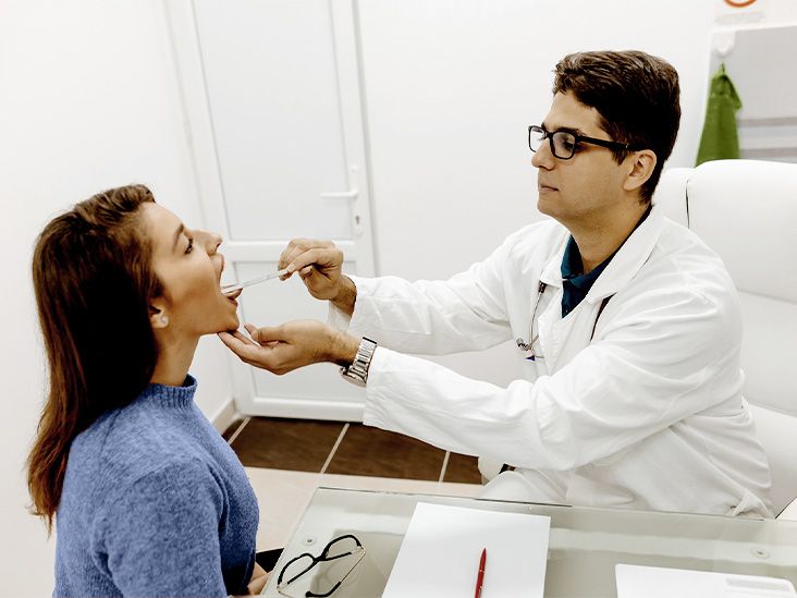 Black spot inside cheek: Pictures, causes, treatment, and more