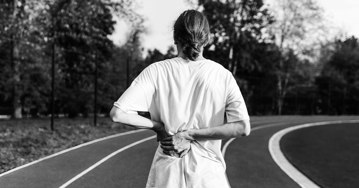 Back pain and nausea: Possible causes and treatments